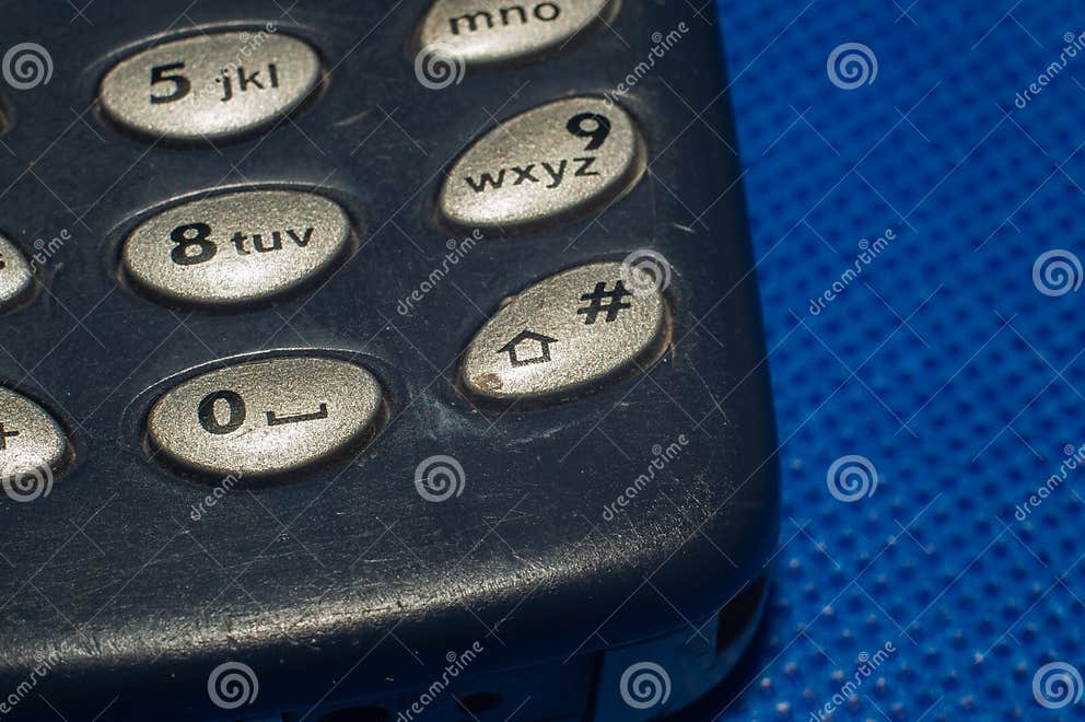 Old Push-button Cell Phone on Blue Background Stock Image - Image of ...