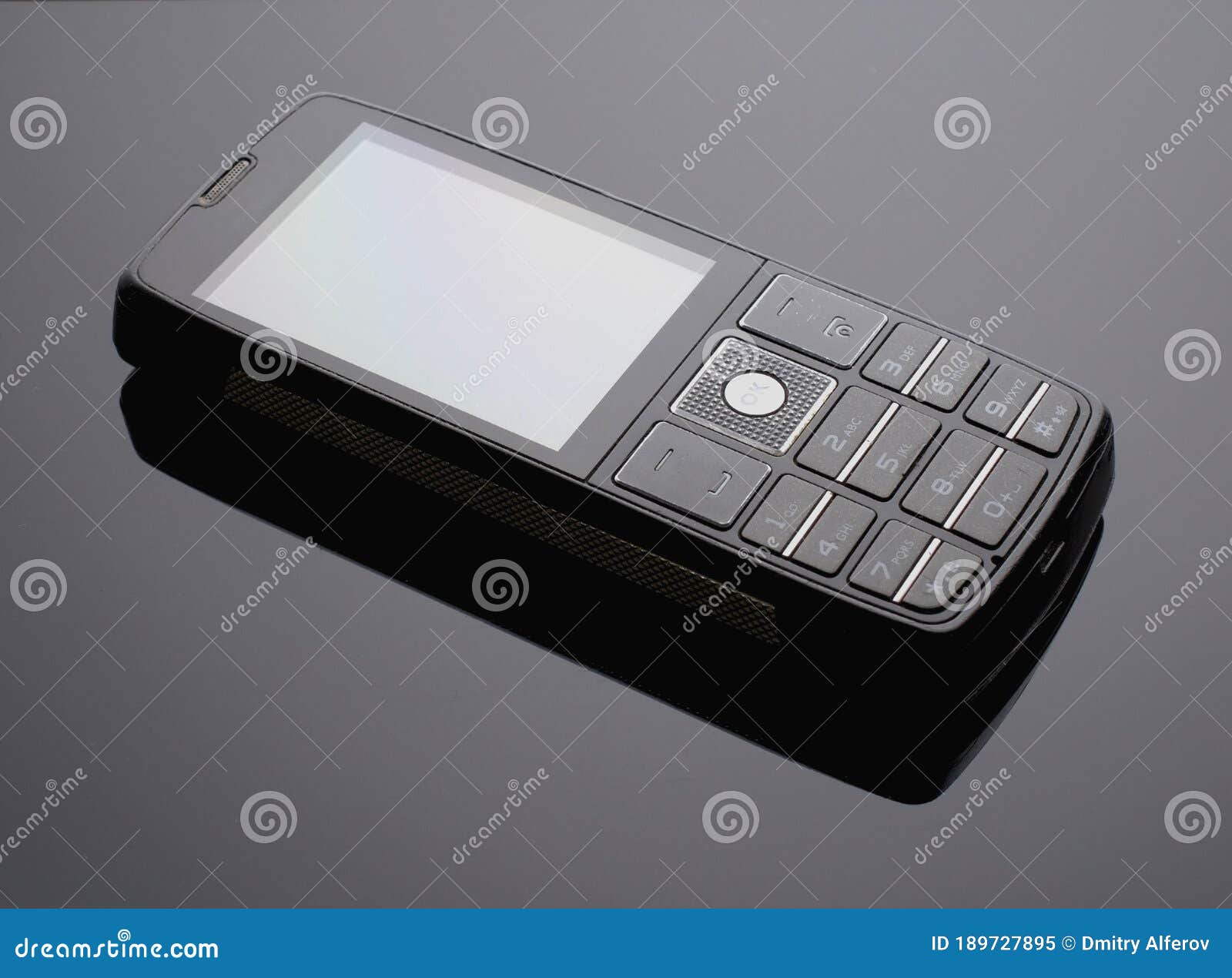 Old Push-button Cell Phone on a Dark Background. White Background Stock ...