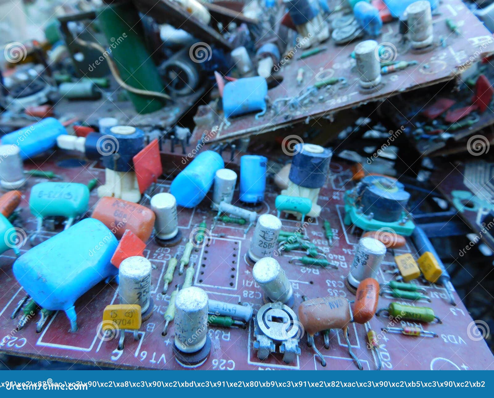 Old Radio Parts on a Printed Circuit Board with Electronic Components ... Old Radio Parts on a Printed Circuit Board with Electronic Components ...