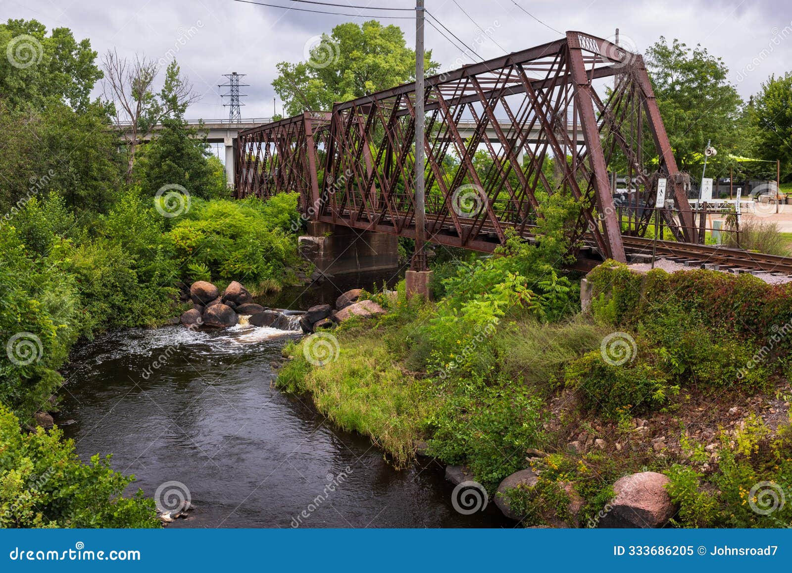 Old Railroad Bridge Crossing a River in Town Stock Image - Image of ...