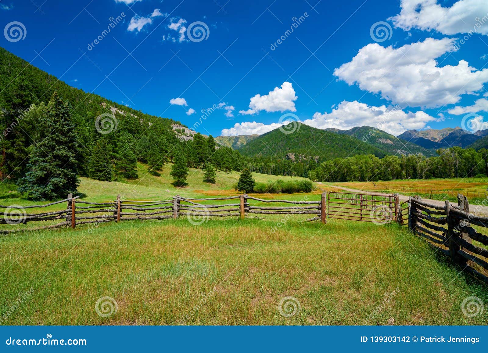 Corral in Apine Setting with Mountains Stock Photo - Image of barn ...