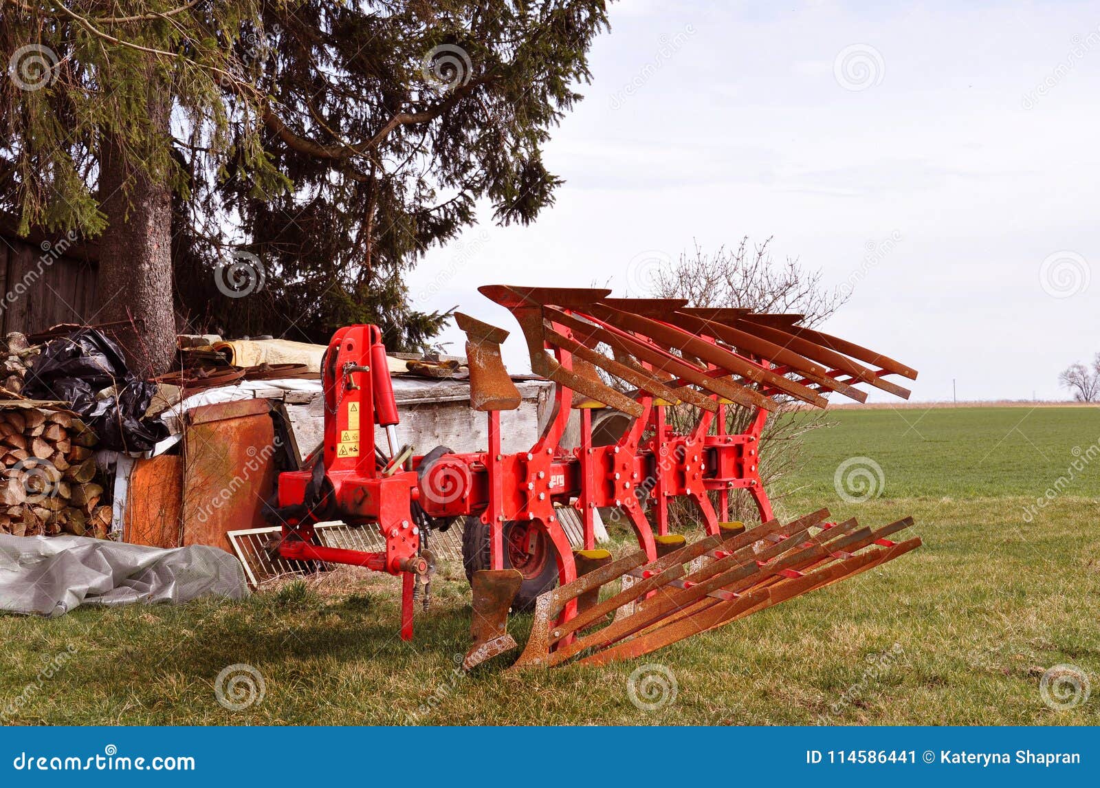 Old Red Agricultural Machine with Rust on it, Rustic Farm Equipment ...