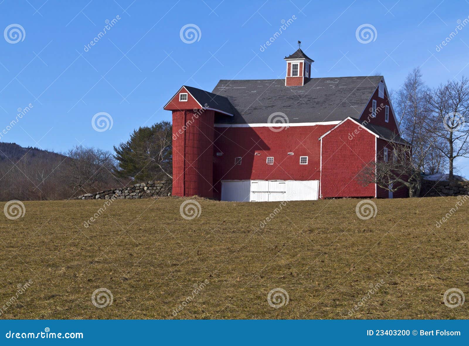Old red barn in field stock photo. Image of white, cupola - 23403200