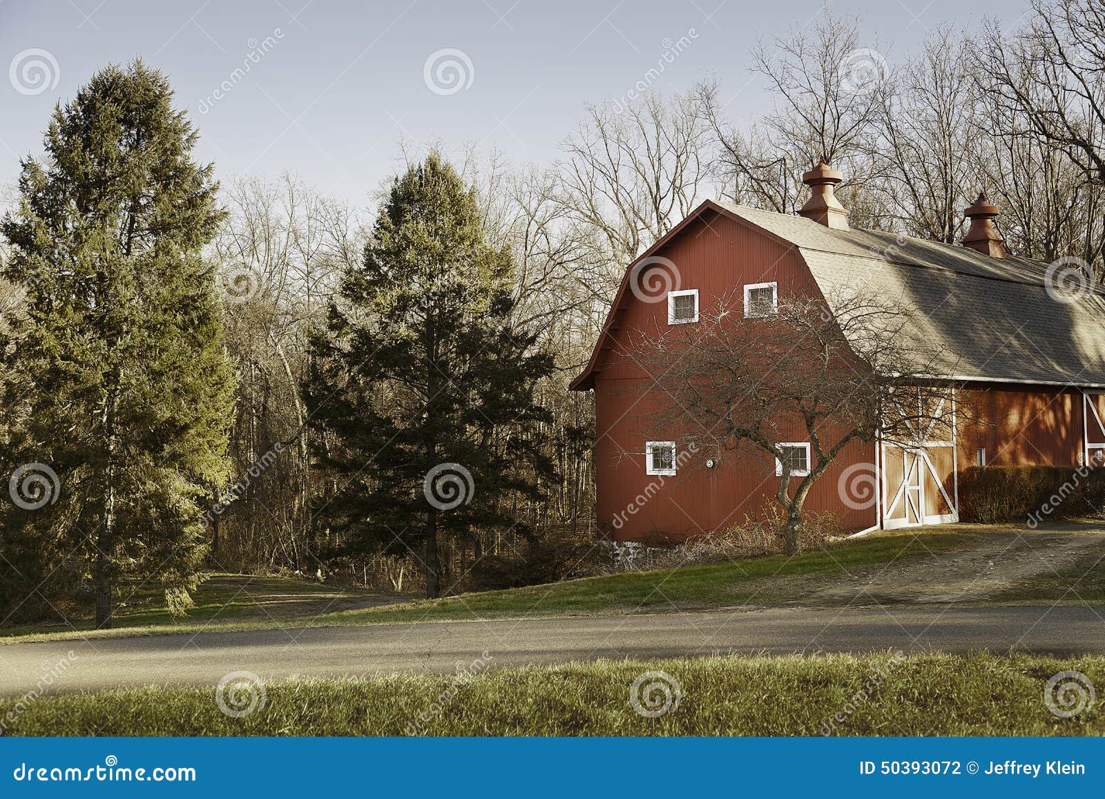 Old Red Barn in Field with Trees Stock Photo - Image of windows, barn ...