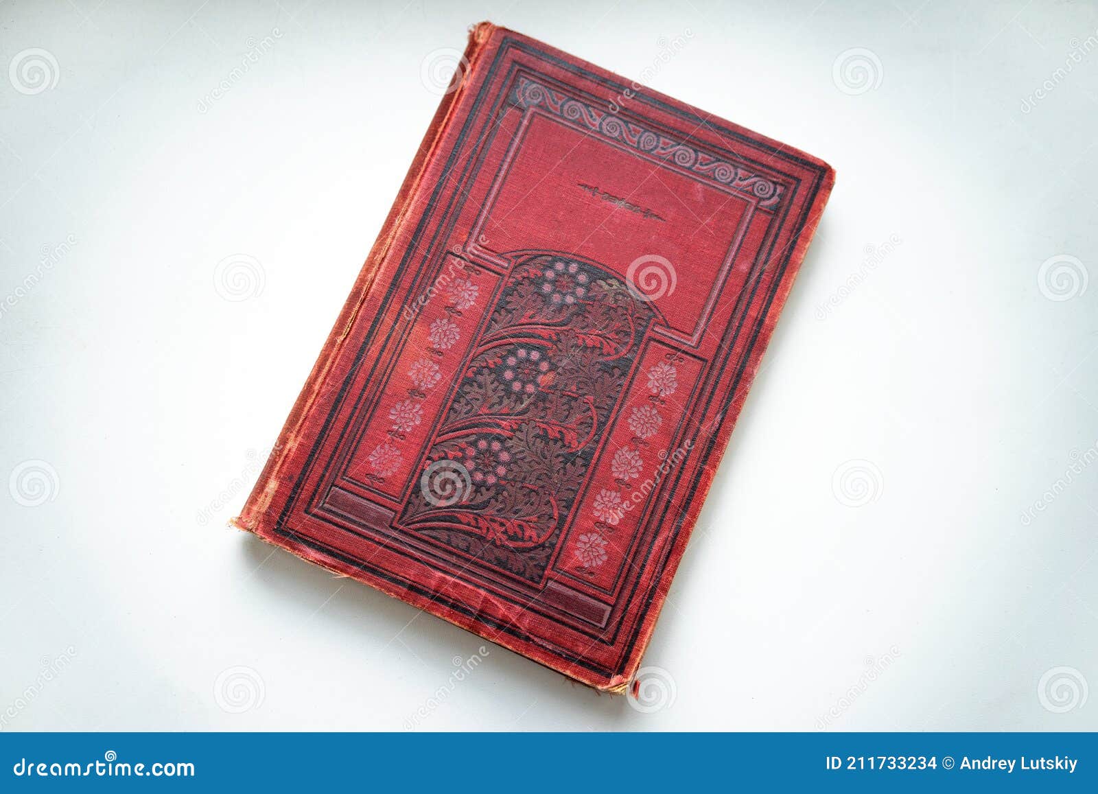 An Old Red Book with Patterns on a White Isolate. Stock Photo - Image ...