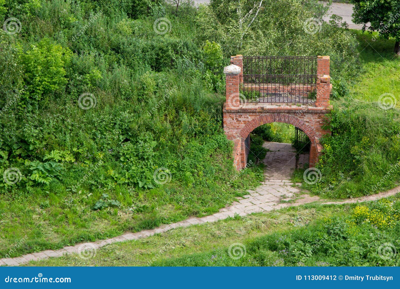 Old Red Brick Bridge and Road in Greenery Stock Photo - Image of nature ...