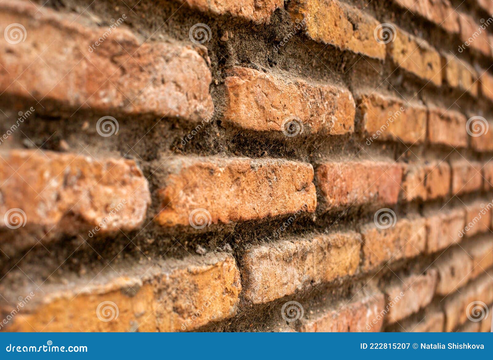 An Old Brick Wall Stretching into the Distance. Stock Image - Image of ...