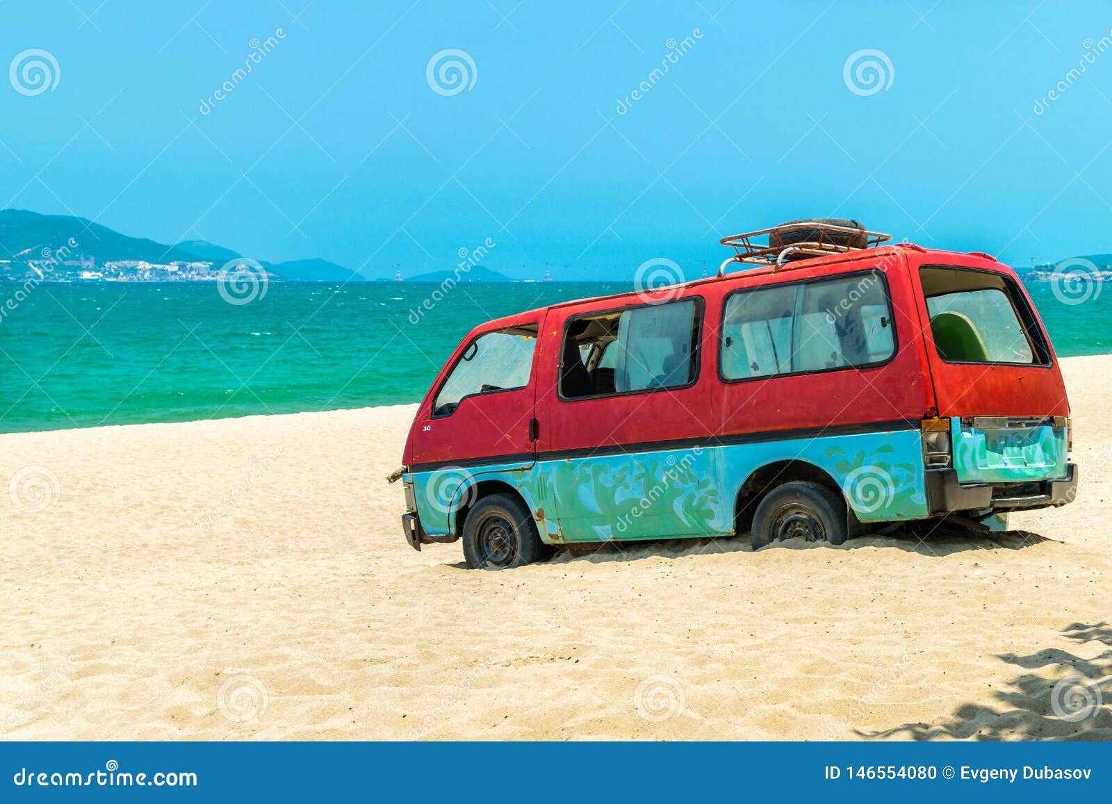 Old Bus In Sand Of Beach With Blue Sea Background Stock Photo - Image ...