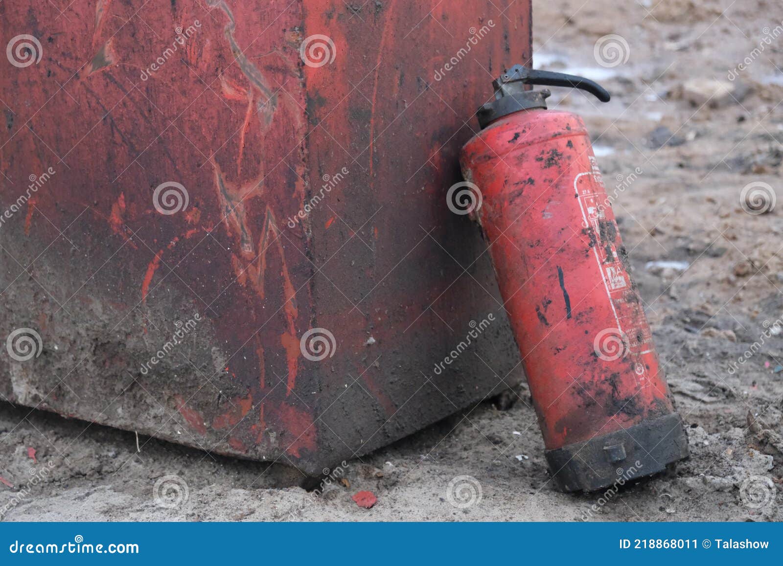 Red Extinguisher In A Homeless Shelter With Many Garbage Stock Image ...