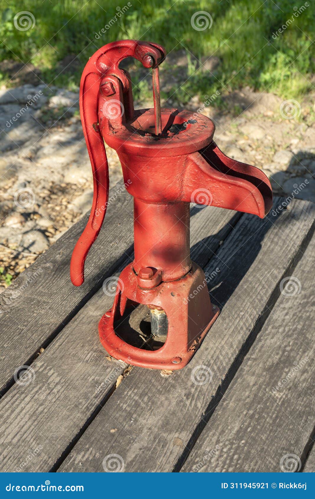 Old Red Hand Water Pump Mounted on Wood Planks Stock Image - Image of ...