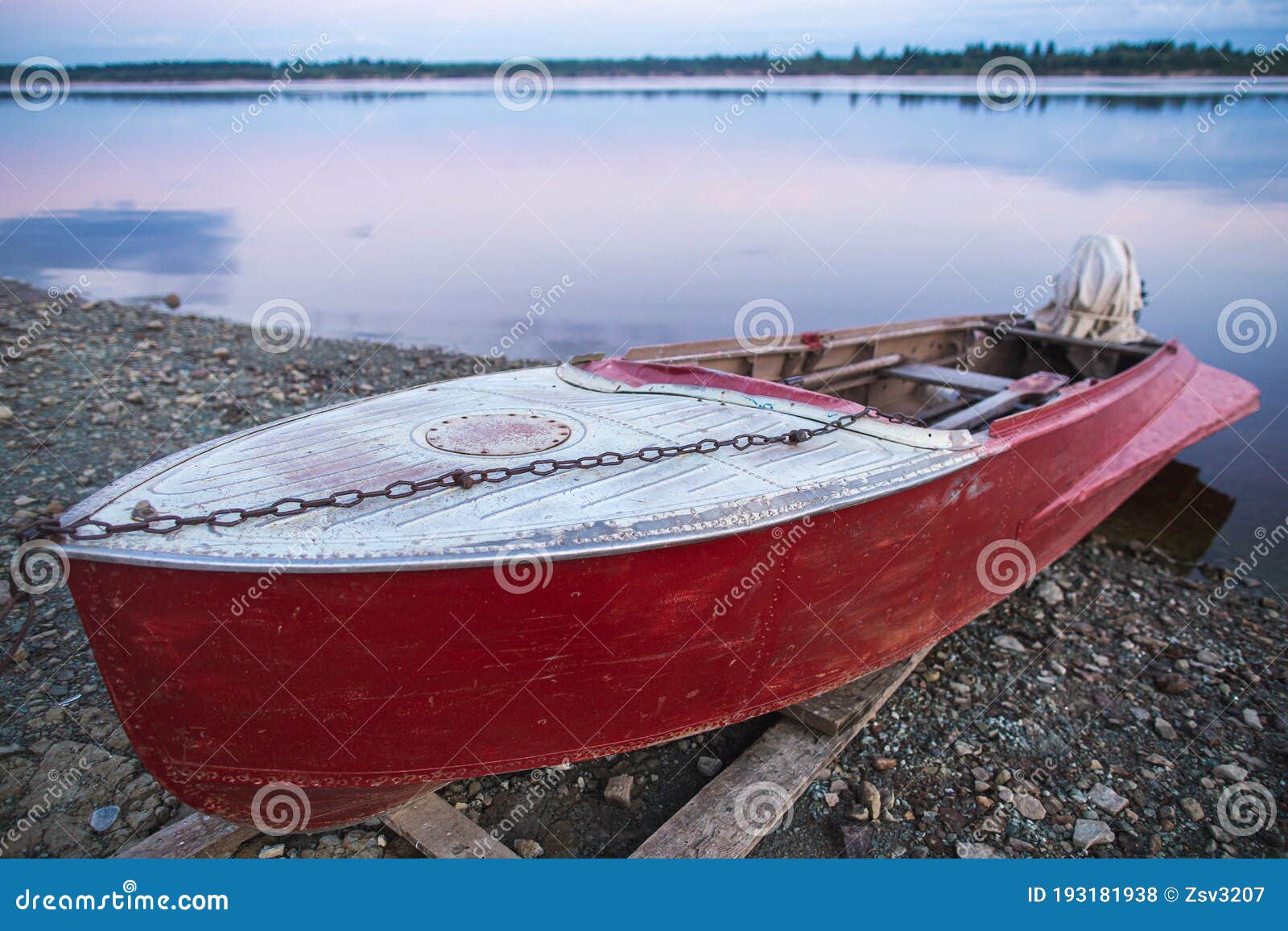 Old Red Rowboat Lying at Shore Stock Photo - Image of beach, peace ...