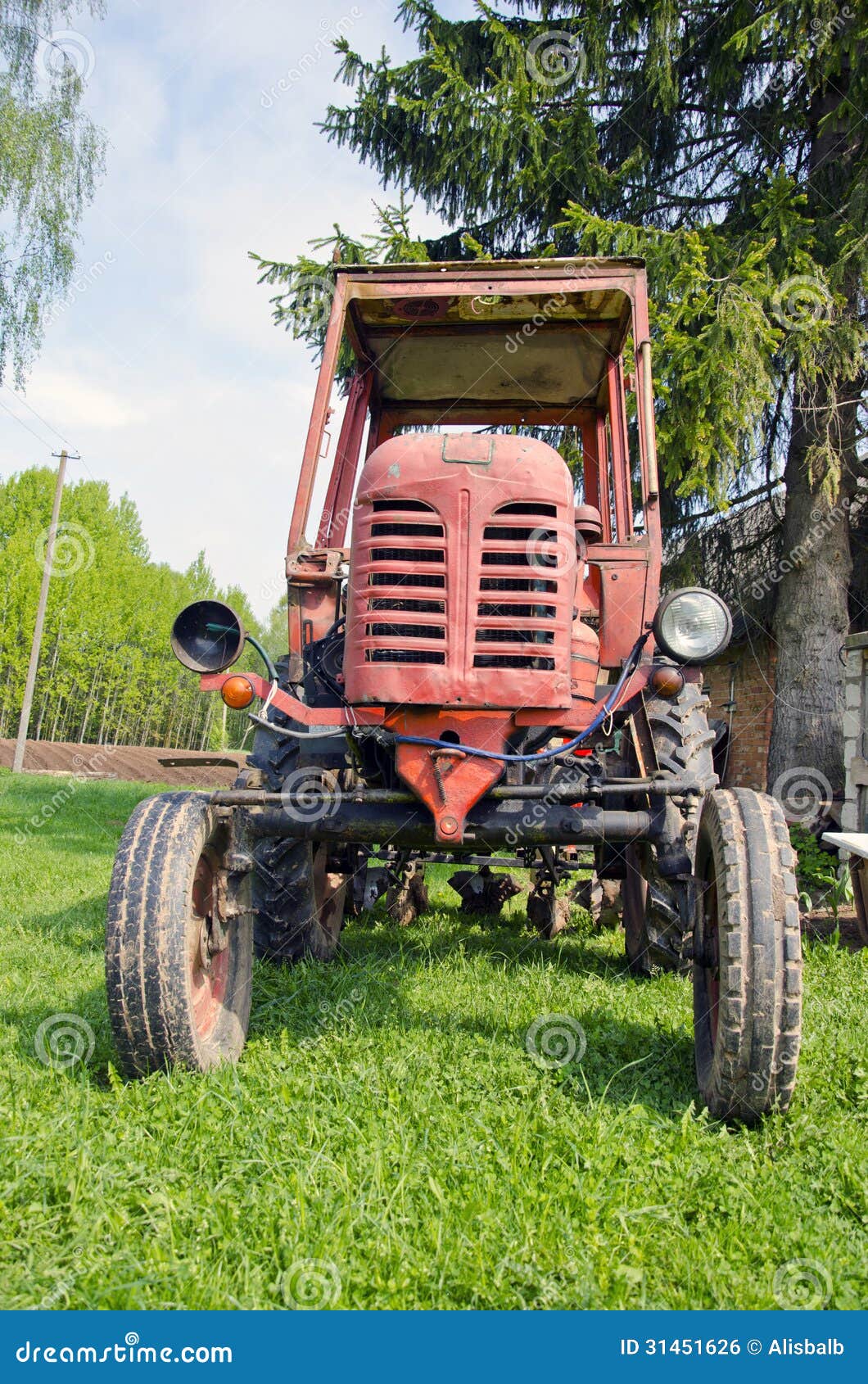 Old Red Tractor on Grass in Farm Stock Photo - Image of field ...