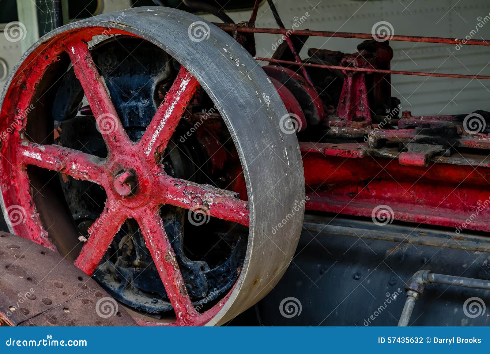Old Red Wheel in Machinery stock photo. Image of machinery - 57435632