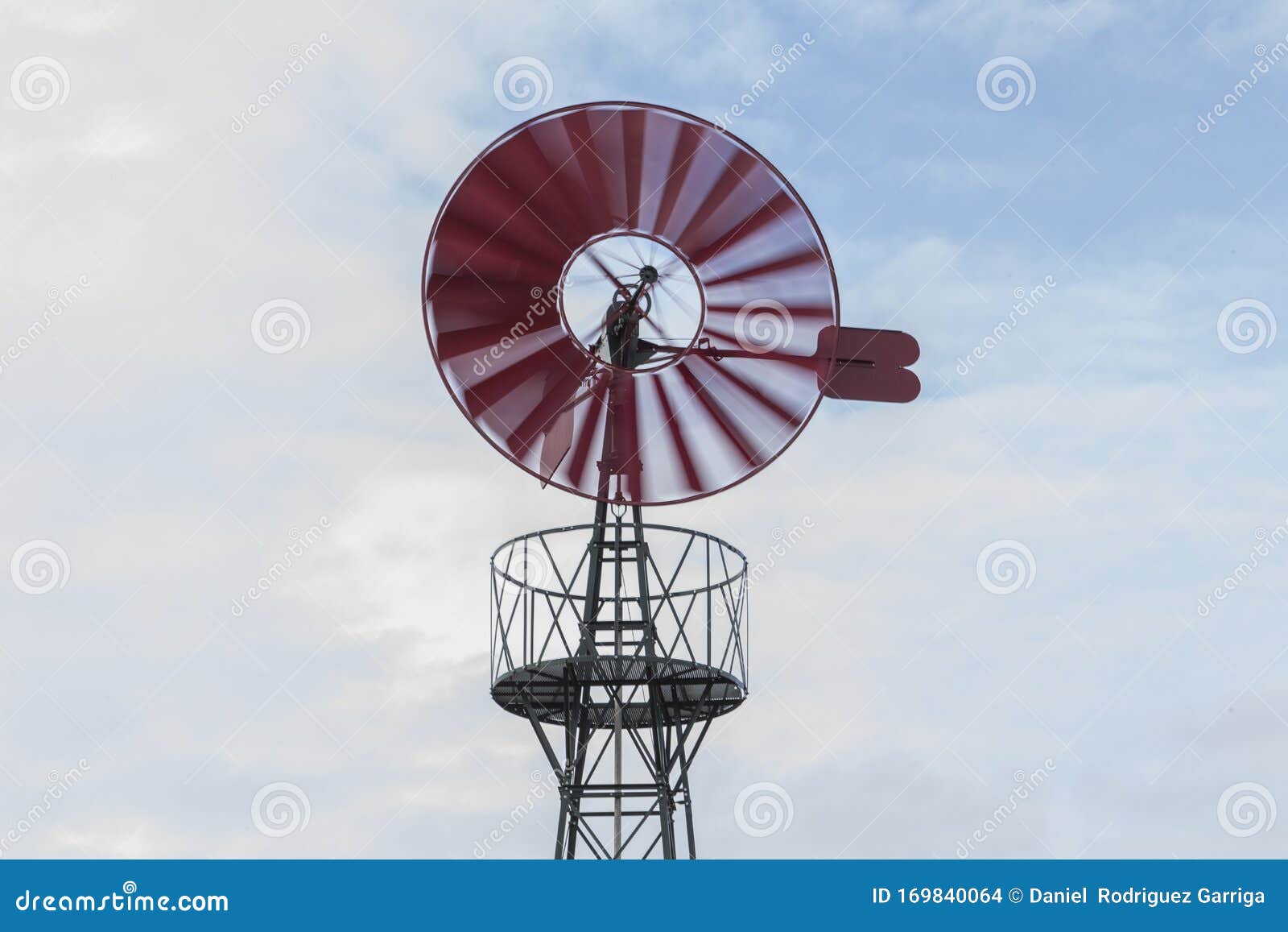 Old red windmill spinning stock photo. Image of energy - 169840064