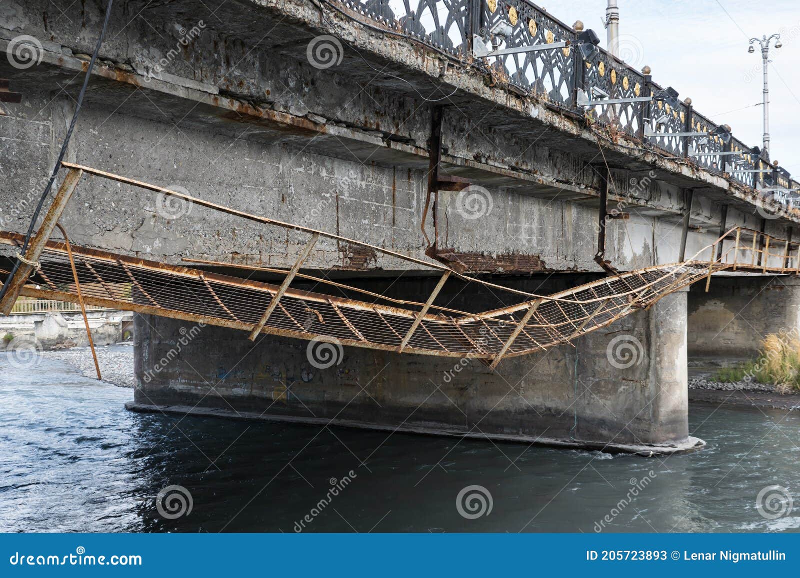 Old Reinforced Concrete Bridge with a Broken One Cross Over the River ...