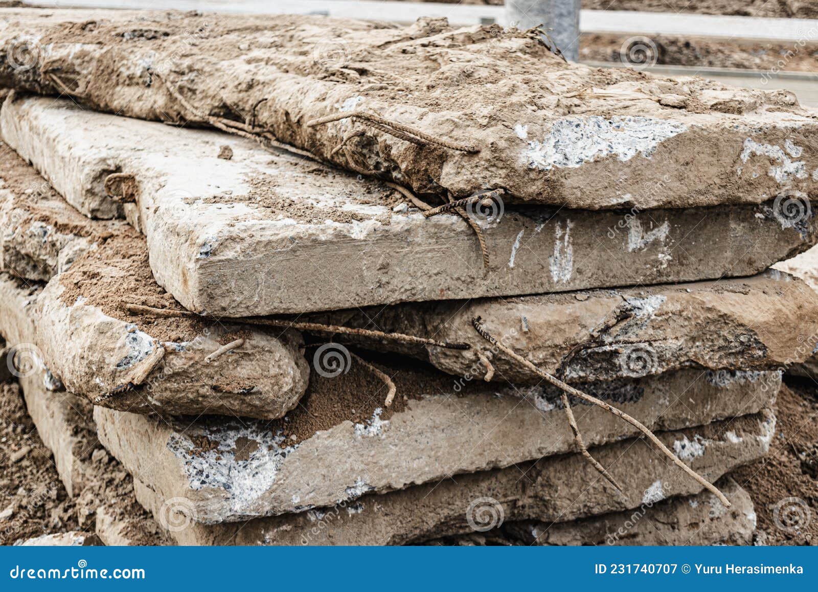 Old Reinforced Concrete Road Slabs Stacked on a Construction Site for ...