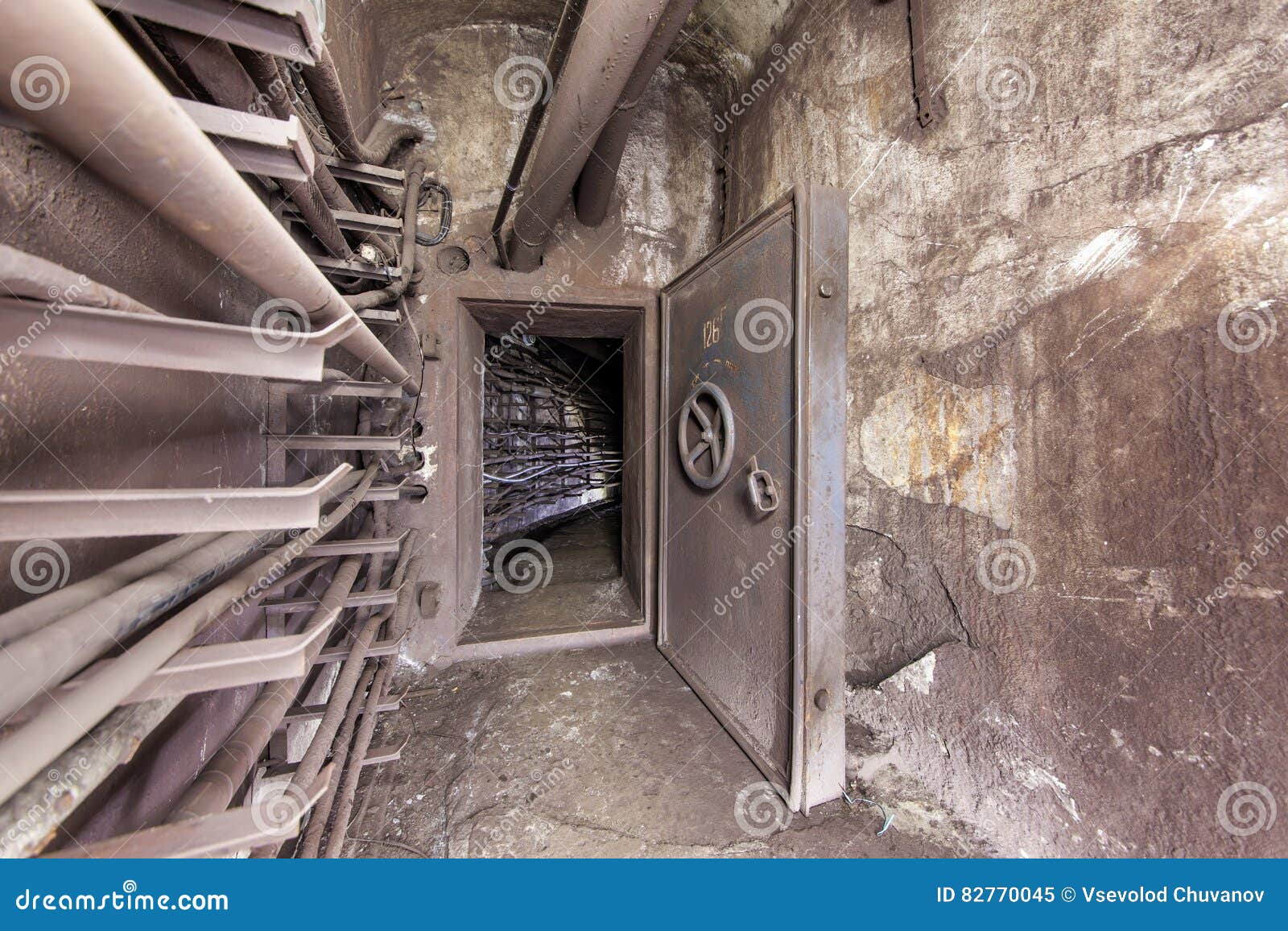 Old Reinforced Security Door in an Underground Communication Tunnel ...