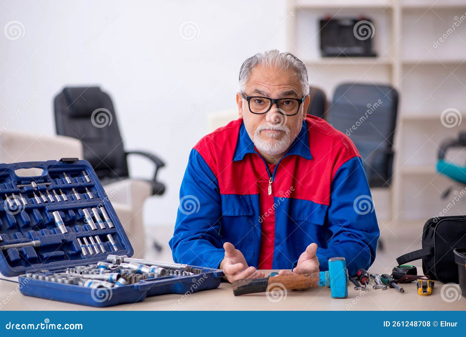 Old Male Repairman Working at Workshop Stock Photo - Image of working ...