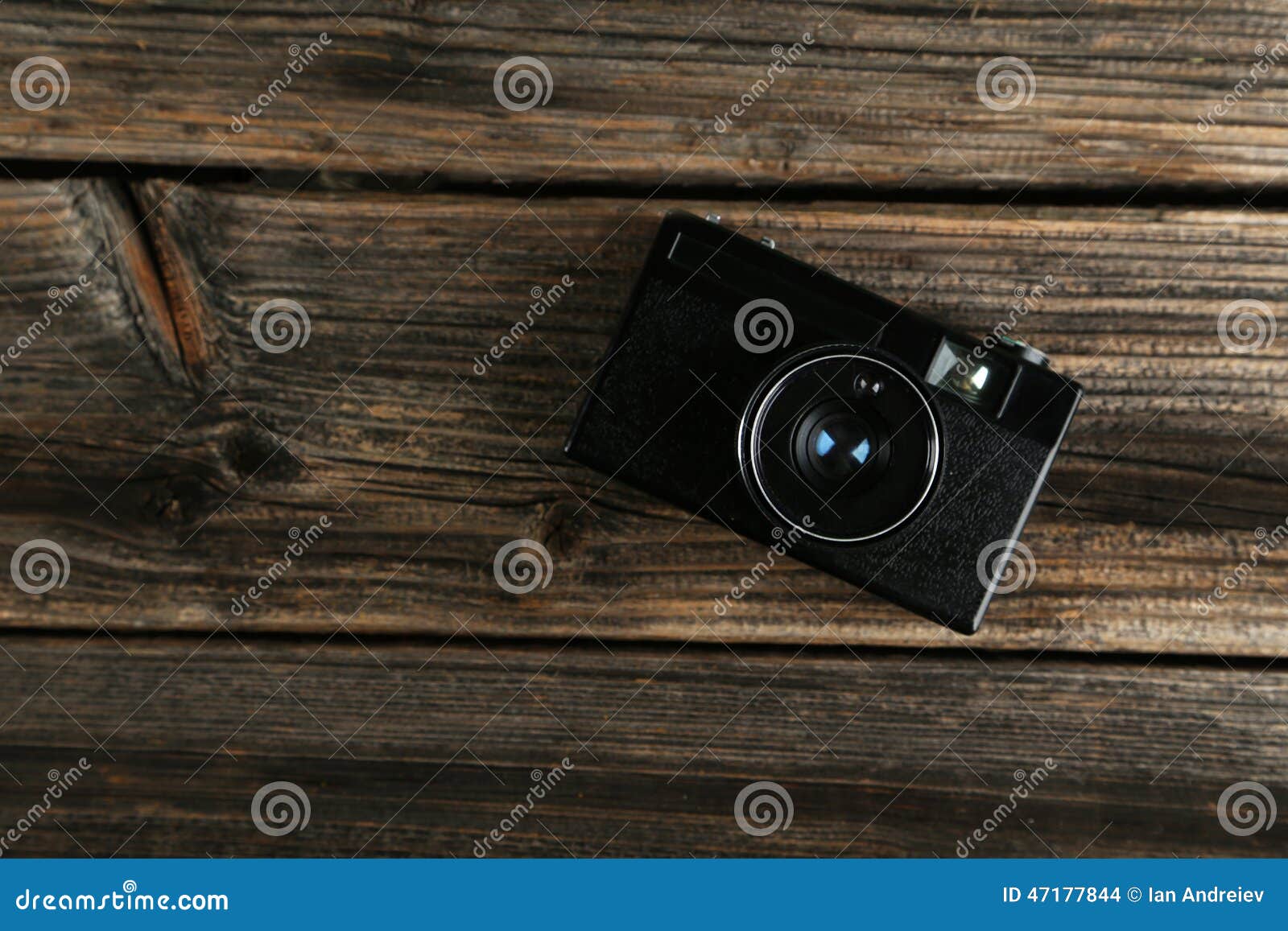 Old Retro Camera on Brown Wooden Background. Stock Photo - Image of ...