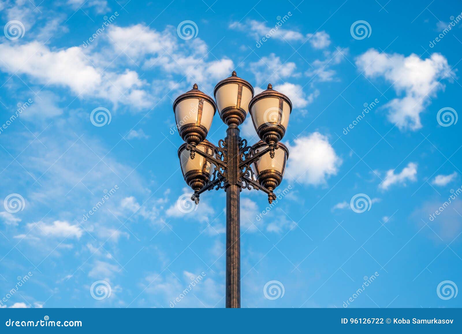The Old Retro Lamp Post and the Beautiful White and Blue Sky Stock ...