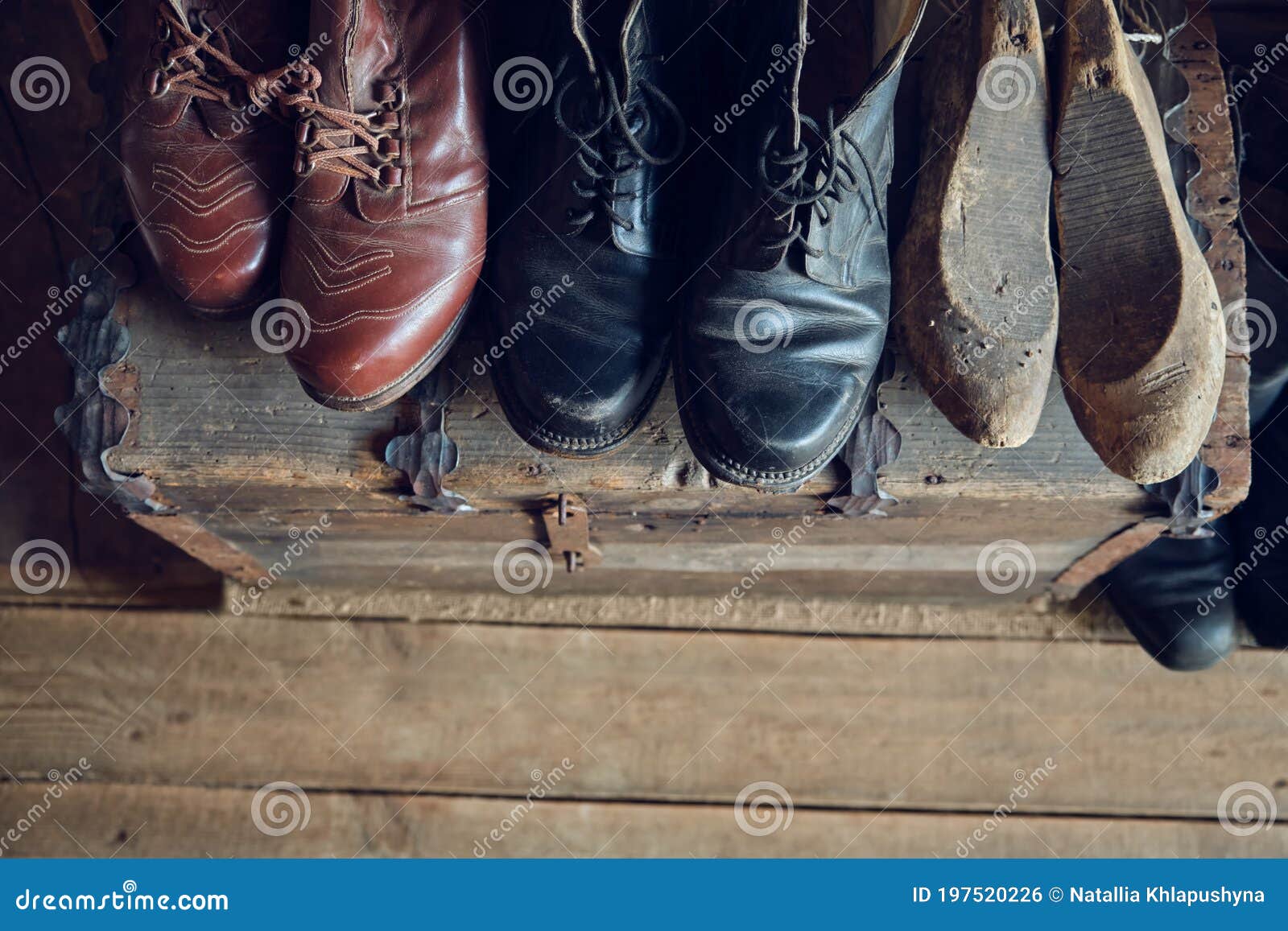 Old Leather Shoes and Shoe Lasts in a Shoemaker Workshop Stock Photo ...
