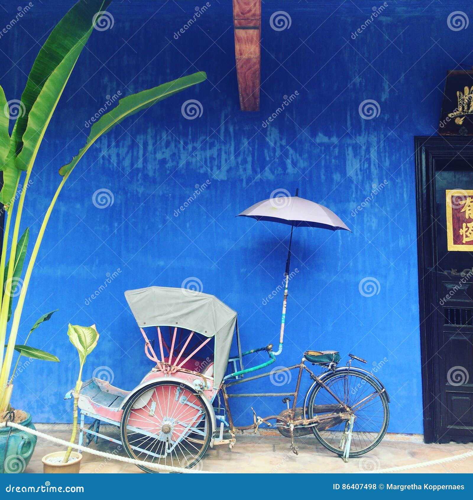 Old Rickshaw in Front of Blue House Stock Photo - Image of ...