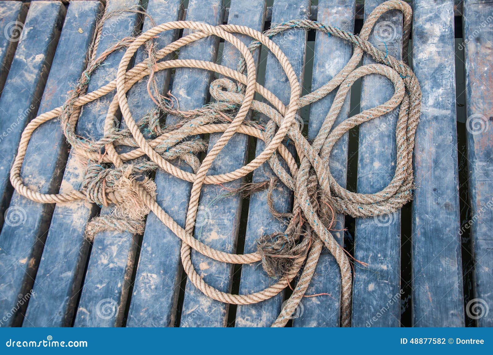 Old rope on dock stock photo. Image of object, rope, tool - 48877582
