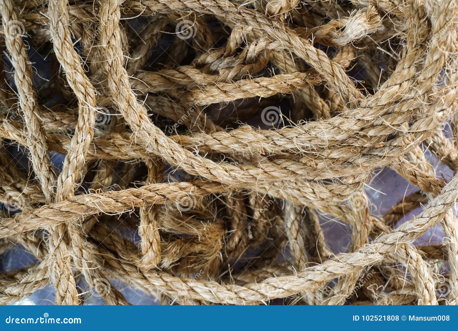 Old rope on the ground stock photo. Image of weathered - 102521808