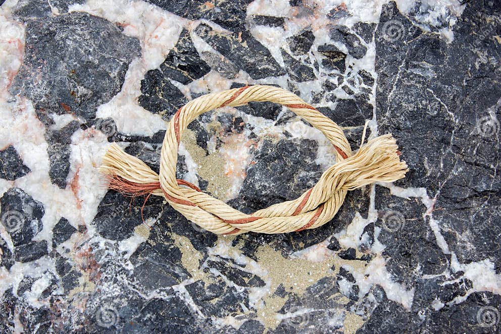 Old rope on stone texture stock photo. Image of stone - 58903344
