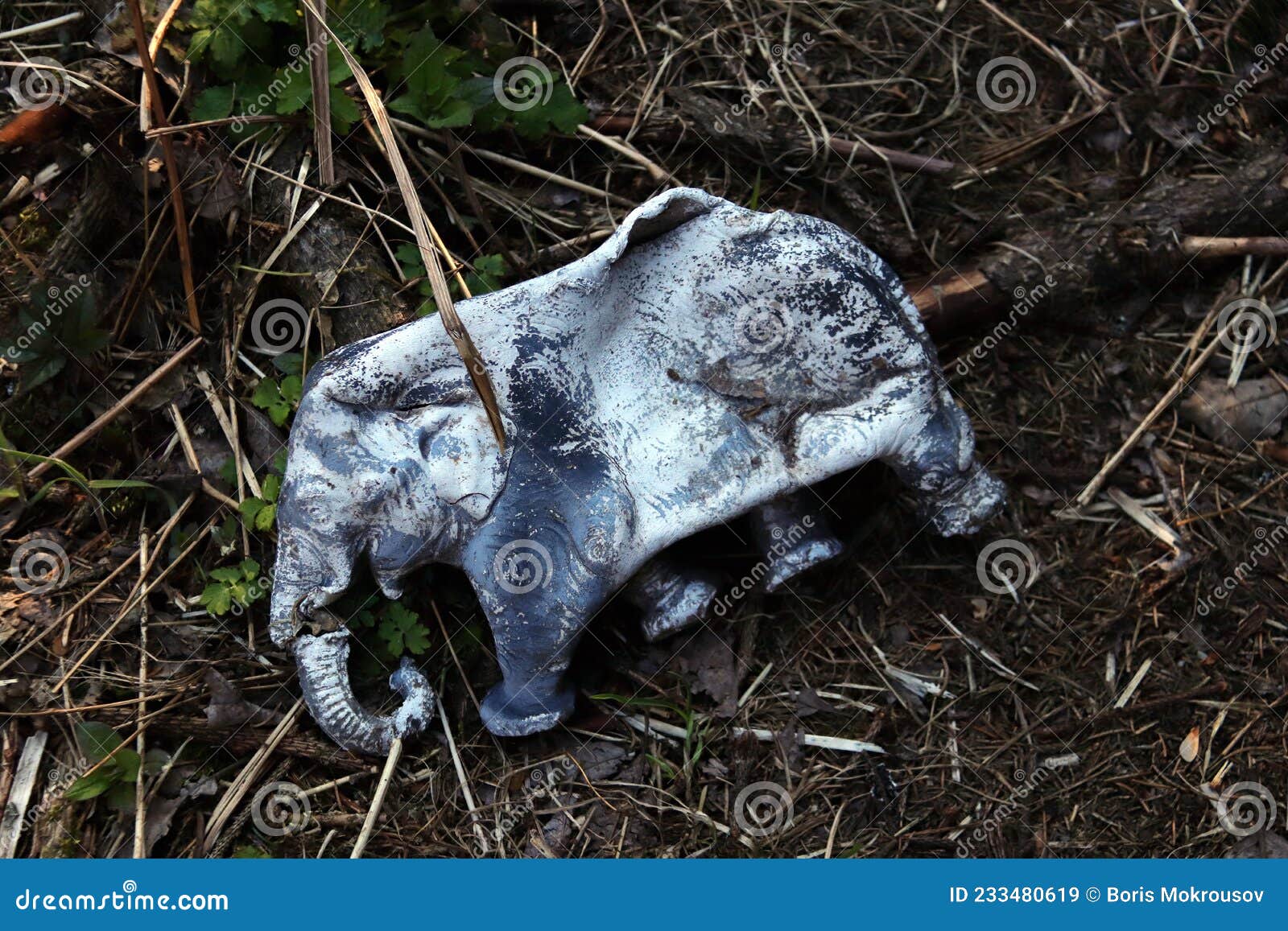 Old Rotten Rubber Toy in the Form of an Elephant in Dirt on the Ground ...