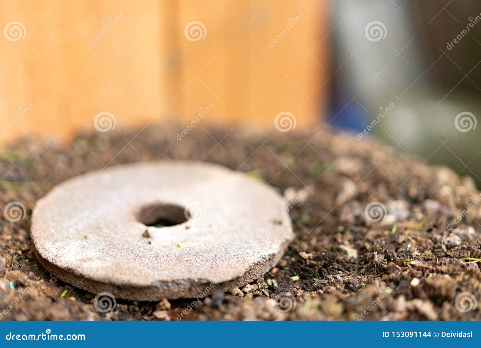 Old Grinding Stone on a Stump. Stock Photo - Image of sharpening, metal ...
