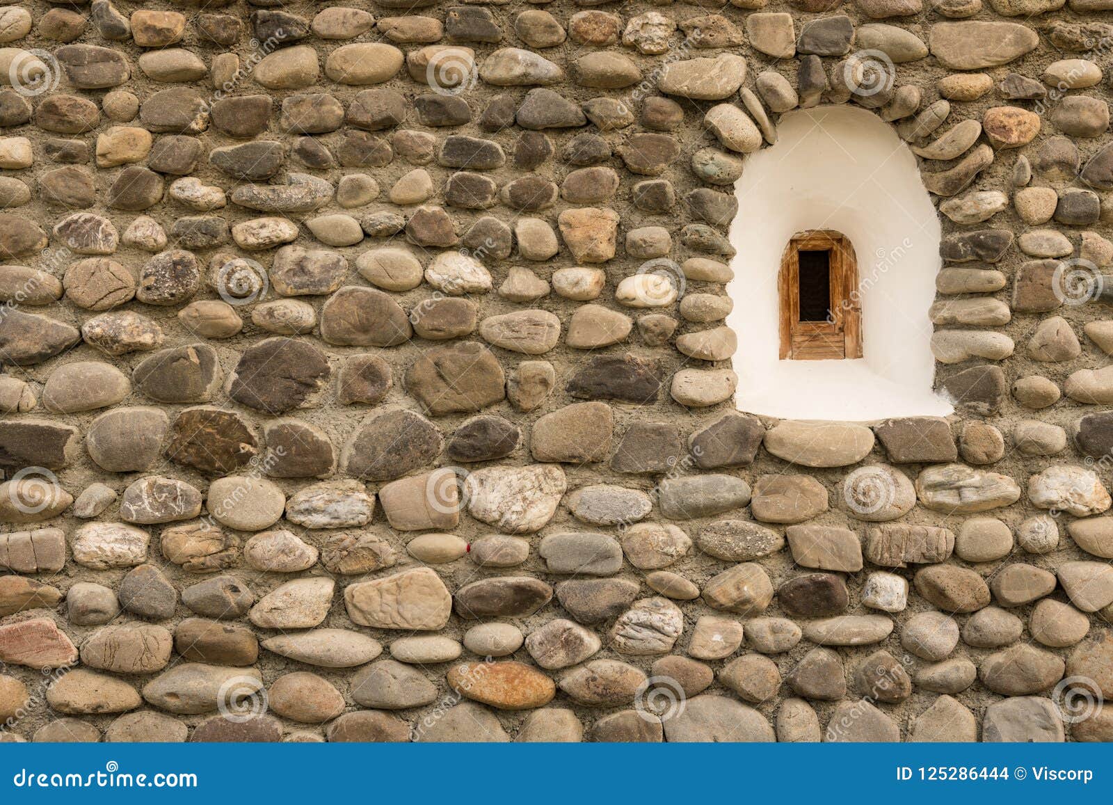 Old Round Stone Wall with Small Window Stock Photo - Image of masonry ...