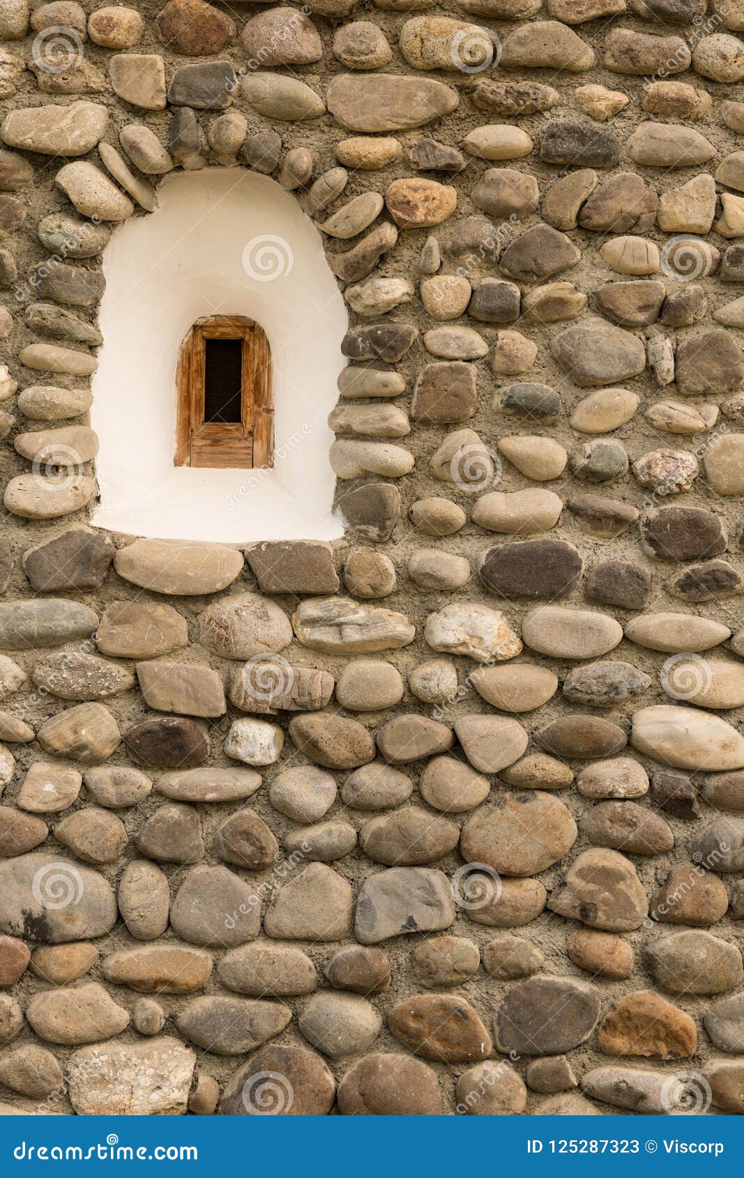 Old Round Stone Wall with Small Window Stock Image - Image of ...