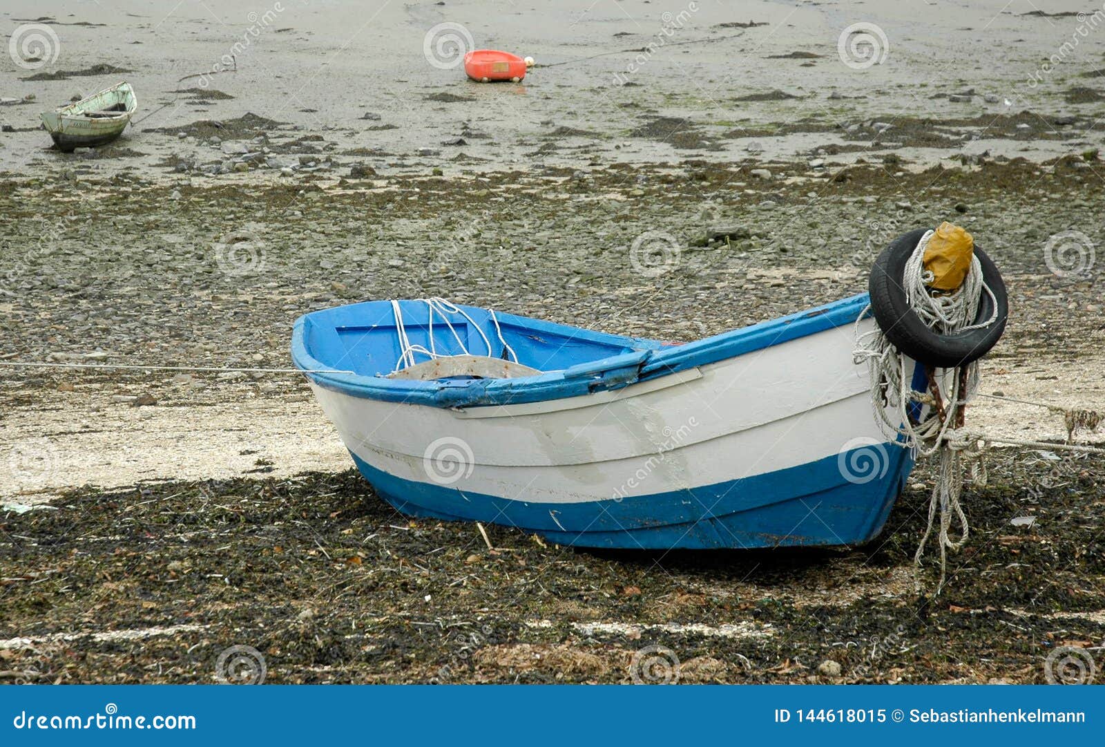 Old rowboat on the beach stock image. Image of wooden - 144618015