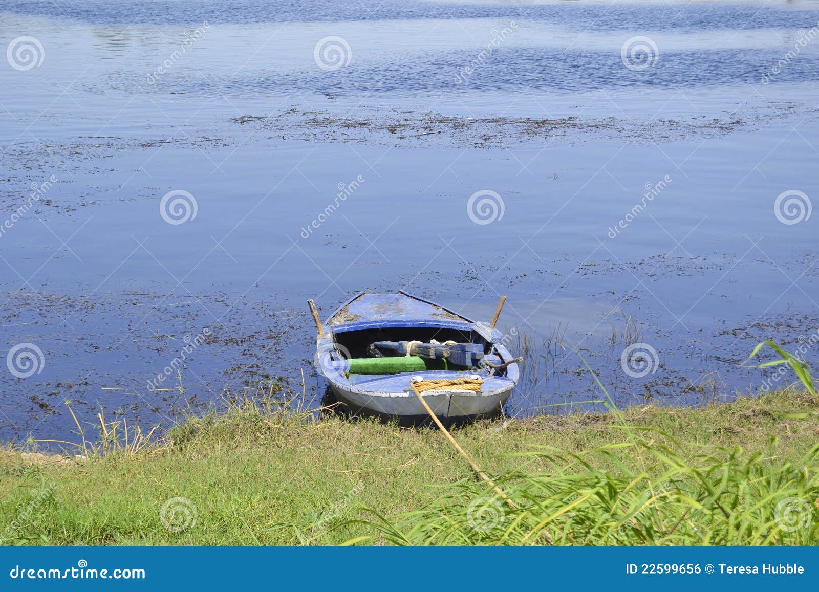 Old Rowing Boat Moored on a River Bank Stock Photo - Image of river ...