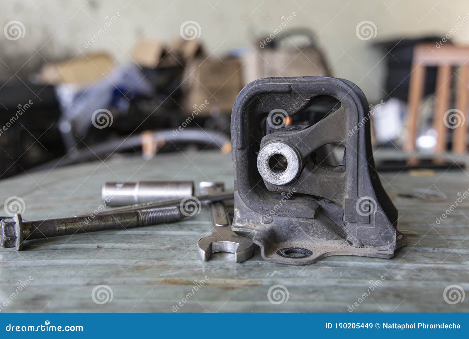 Old Rubber Engine Mount with Tools on the Table Background Stock Image ...