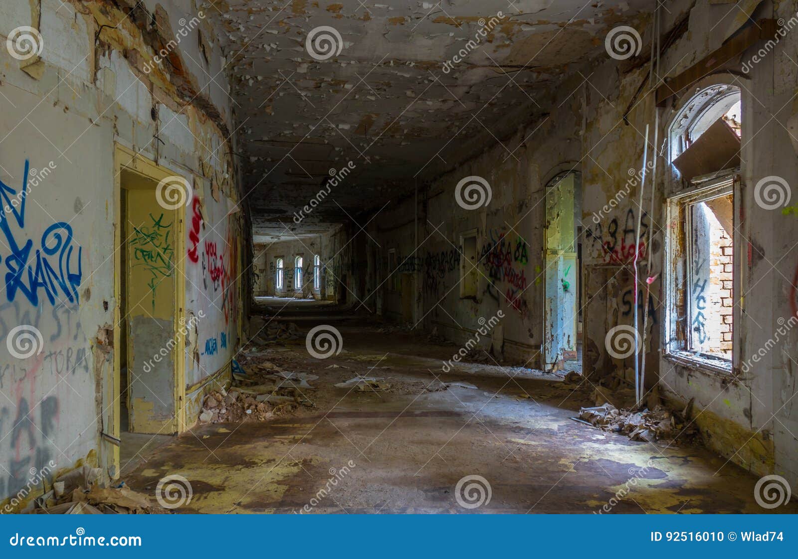 Ruined Room With Holes In Wall, Ceiling And Broken Windows In A Loft ...