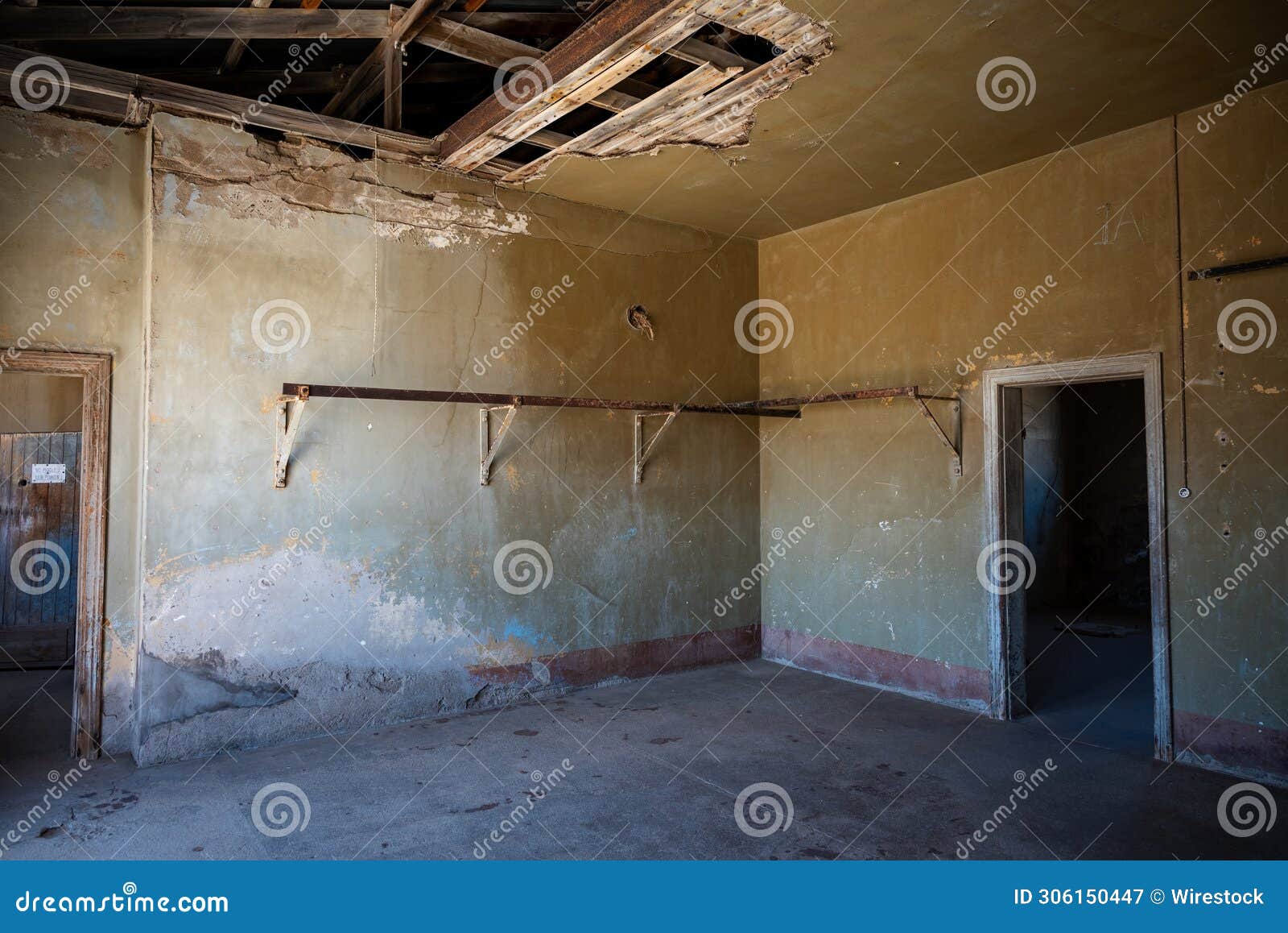 An Old Run Down Room that is Torn Apart and Covered with Paint Stock ...