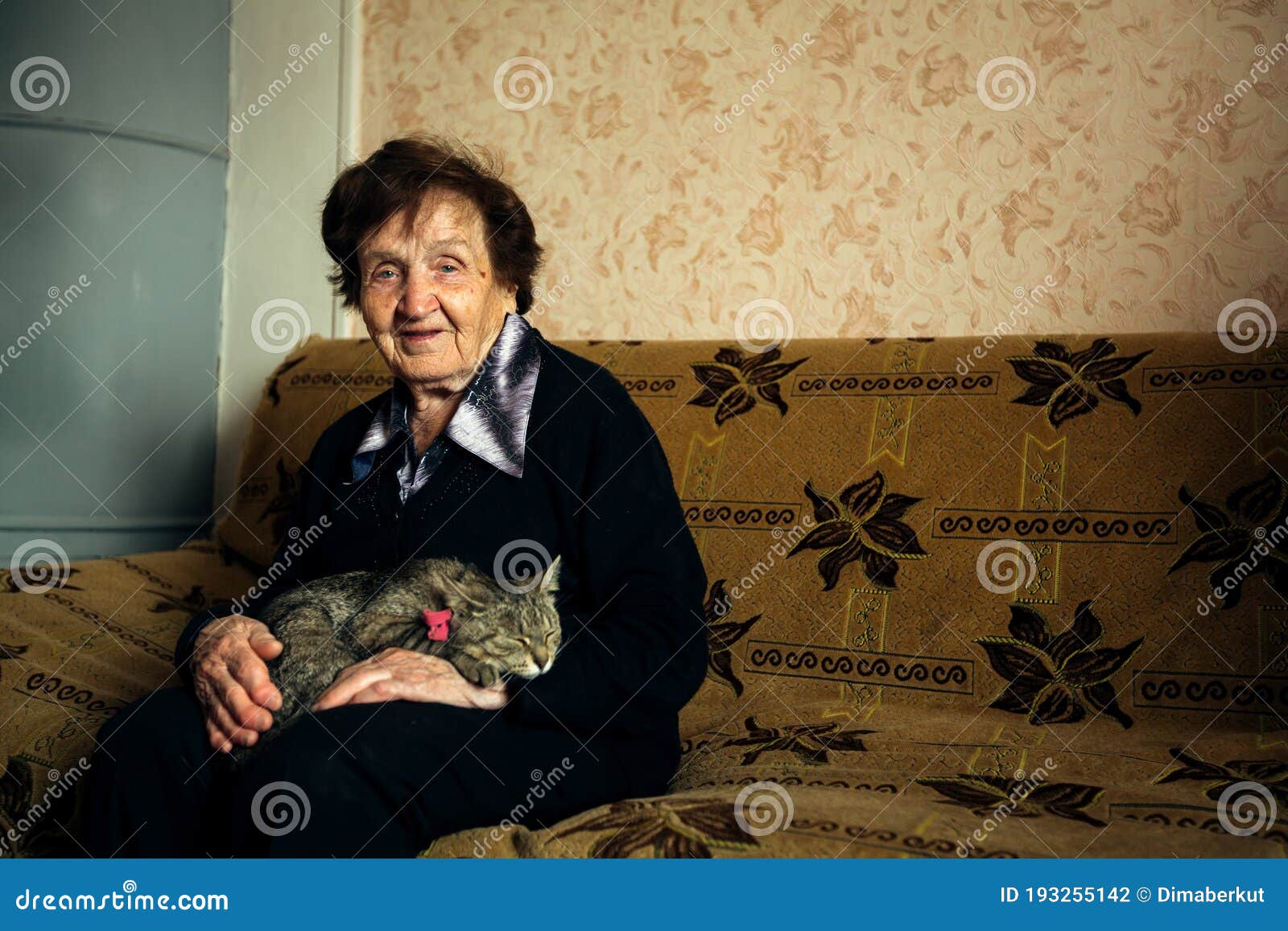 An Old Russian Woman with Her Cat at the Home. Stock Photo - Image of ...