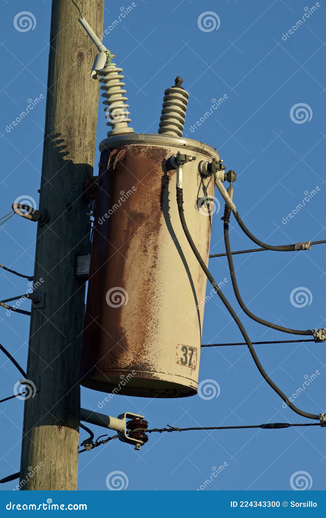 Old Rusted Electrical Transformer on Wood Pole Stock Photo - Image of ...