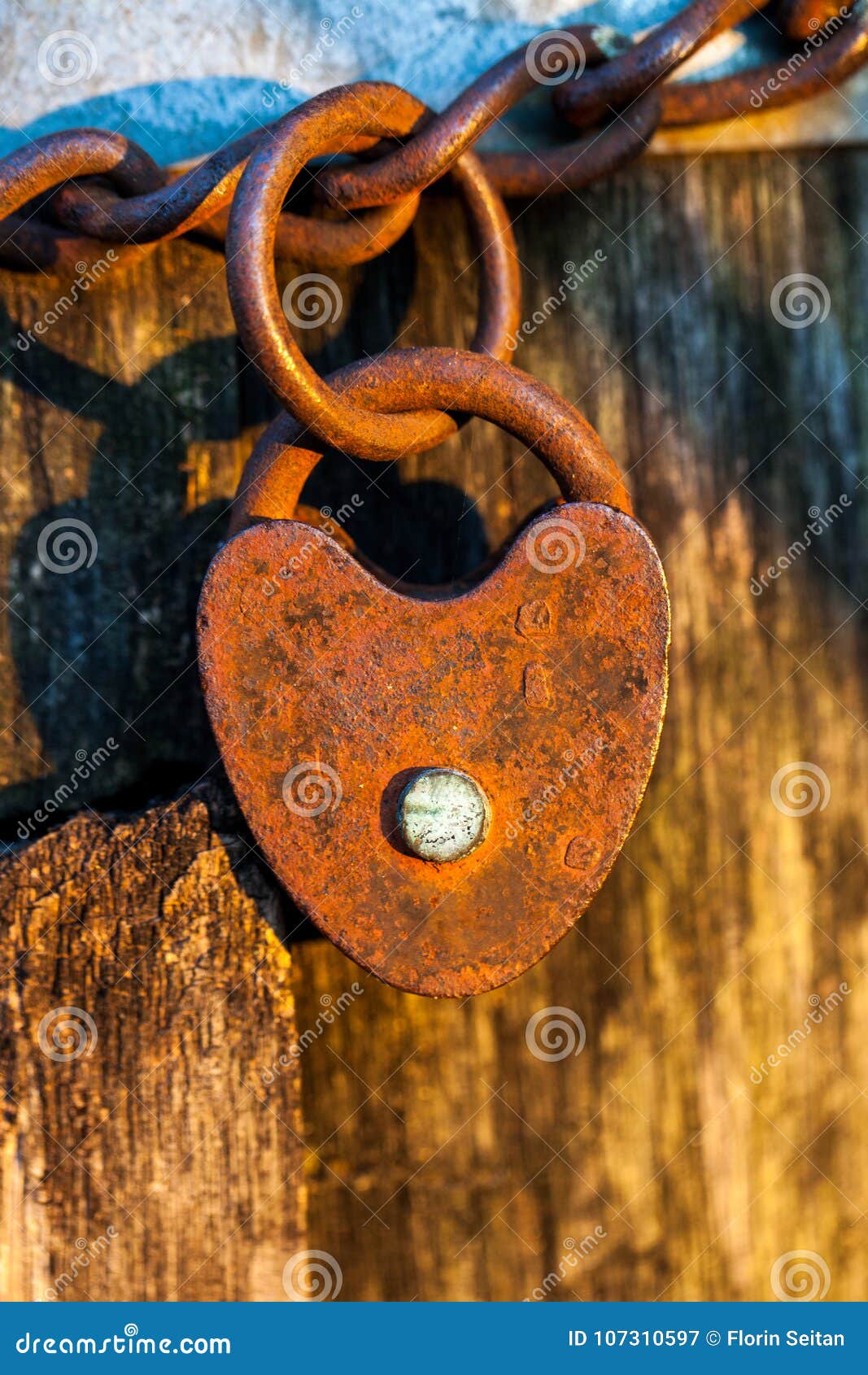 Old Rusted Heart Shaped Padlock on a Loop Chain Stock Image - Image of ...