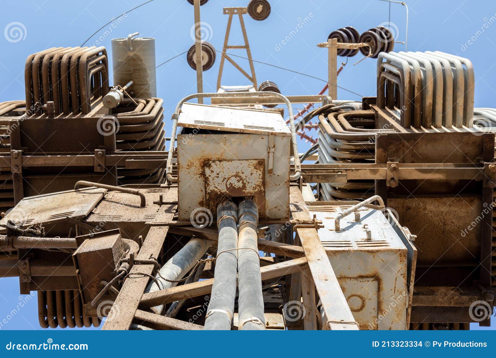 Old Rusted High Voltage Transformer Bottom View Stock Photo - Image of ...