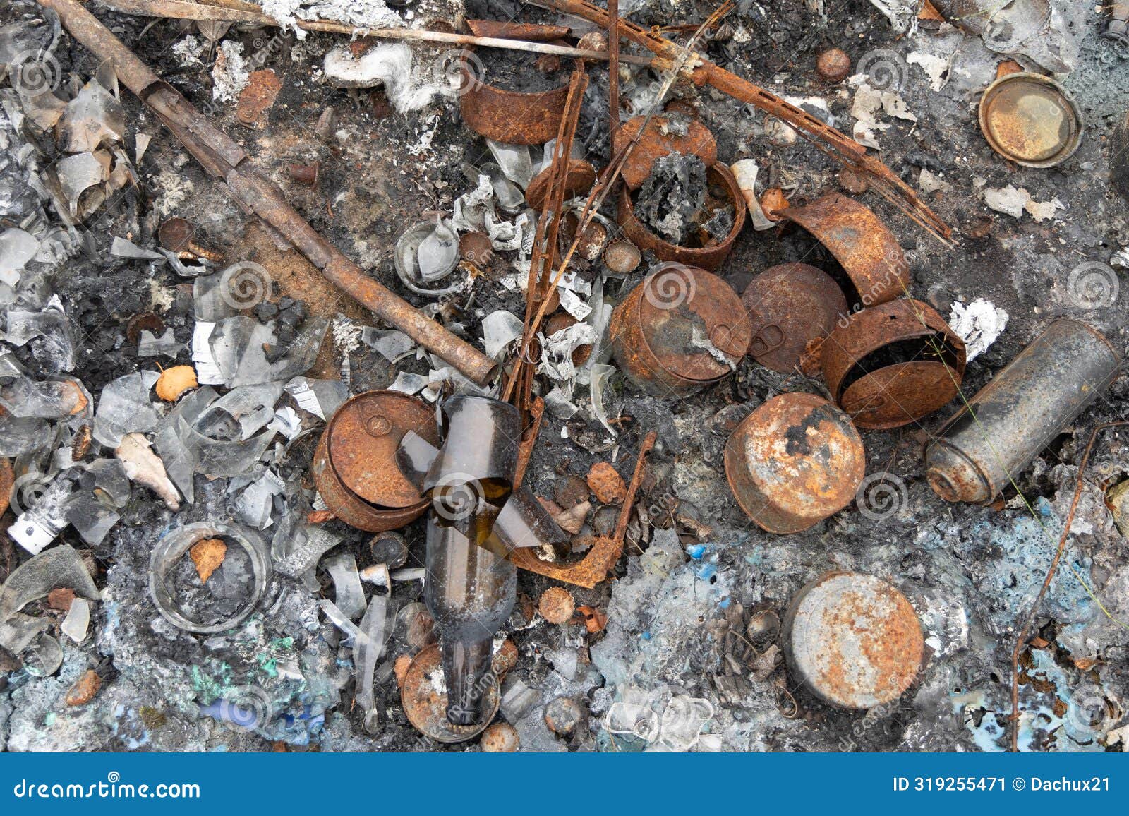 Old, Rusted Metal Cans in Burned Ash. Trash in Abandoned Army Base ...