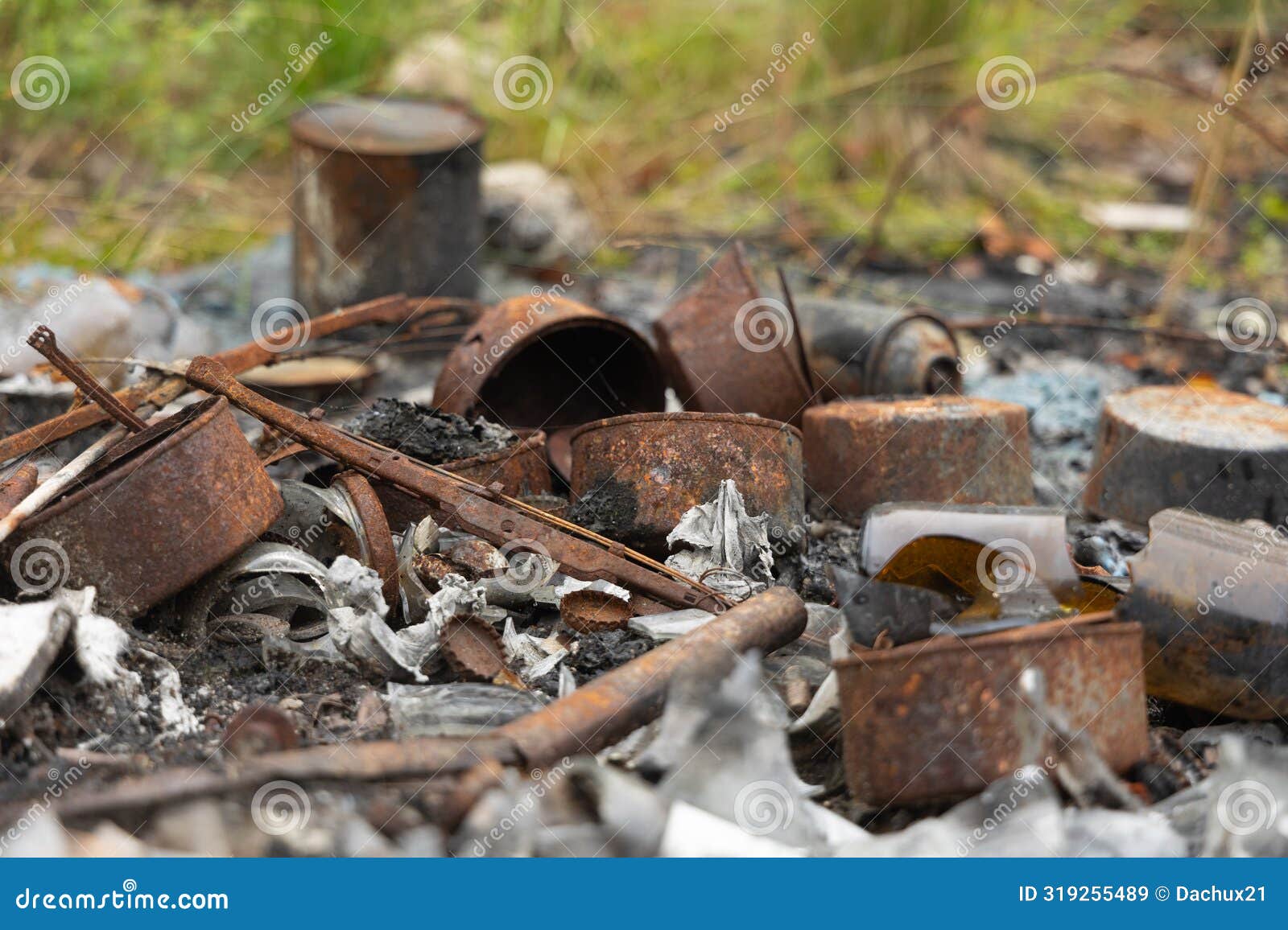 Old, Rusted Metal Cans in Burned Ash. Trash in Abandoned Army Base ...