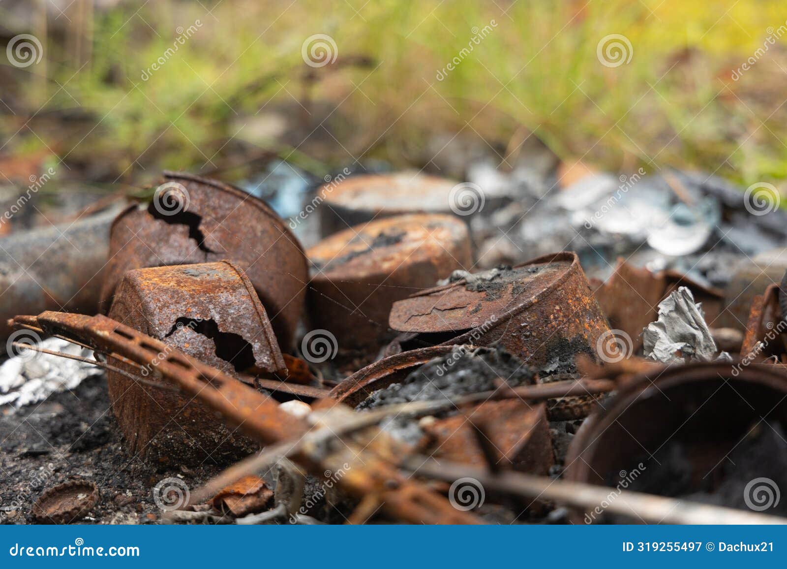 Old, Rusted Metal Cans in Burned Ash. Trash in Abandoned Army Base ...