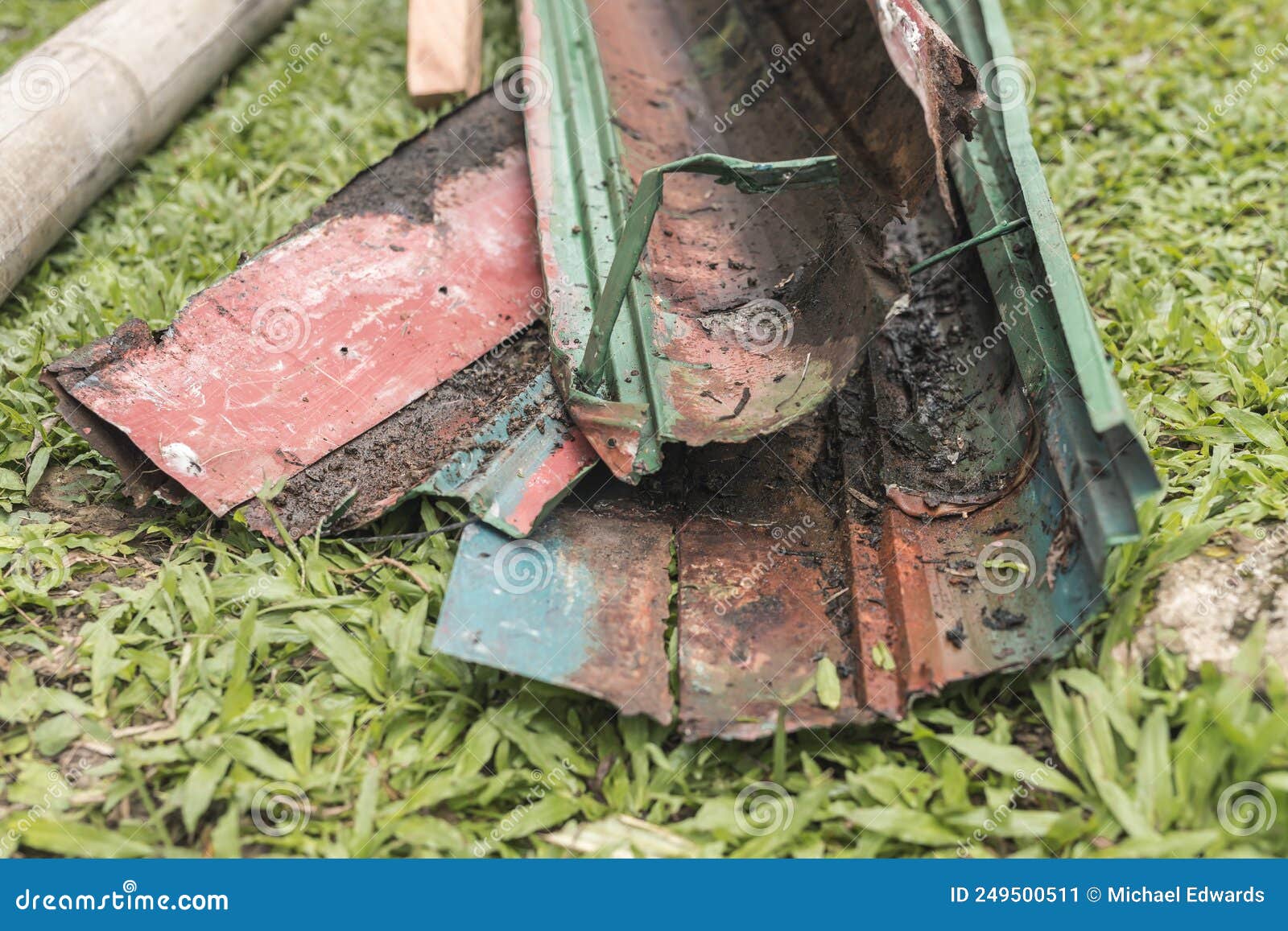 Old and Rusted Metal Gutters Stripped Off and Laying on the Ground ...