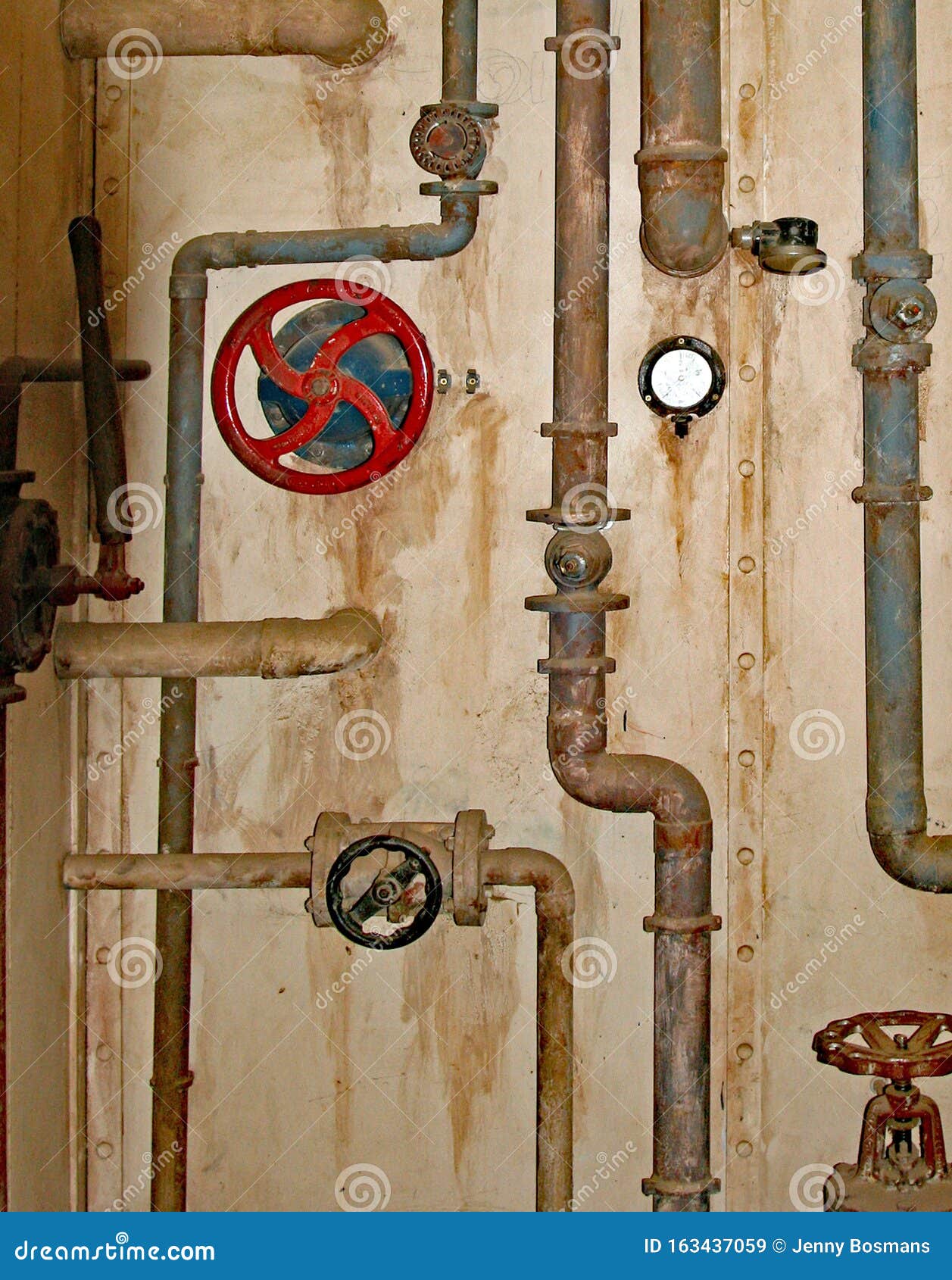 Old Rusted Pipes and Valves Against a Metal Wall Stock Image - Image of ...