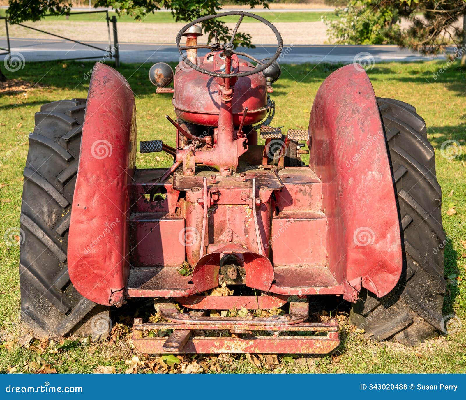 Old Rusted Red Tractor on a Farm Big Wheels Stock Photo - Image of ...