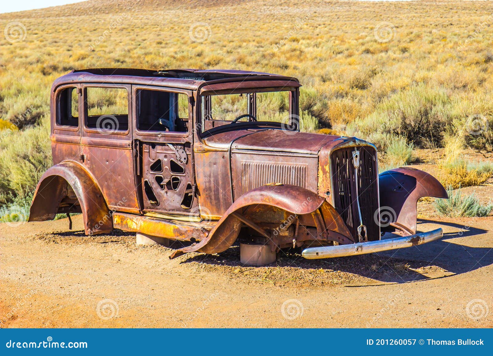 Old Rusted Shell of Antique Automobile Abandoned in High Desert Stock ...