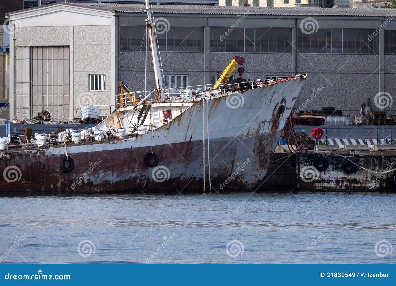 Old rusted ship in harbor editorial photography. Image of crane - 218395497